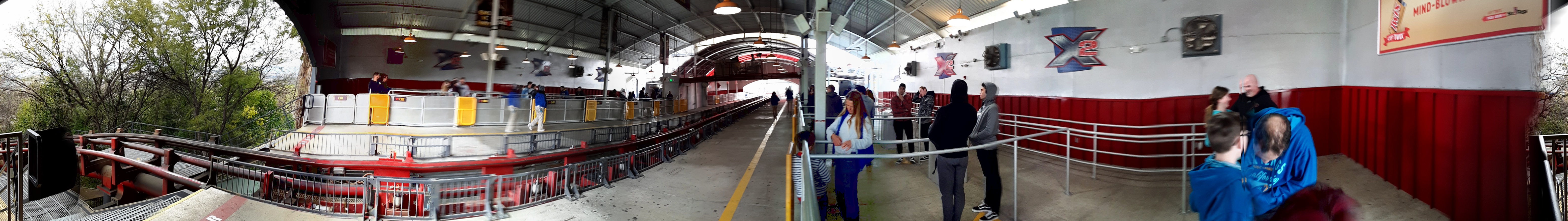 The line to get on X2, arguably the mostt popular coaster here.